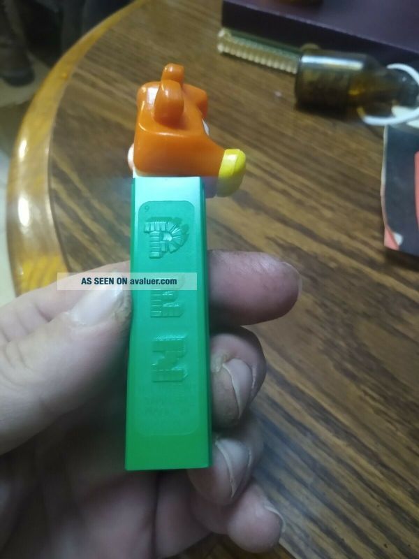 VINTAGE PEZ NO FEET ORANGE COW HEAD WITH LIGHT GREEN BASE | #50267868