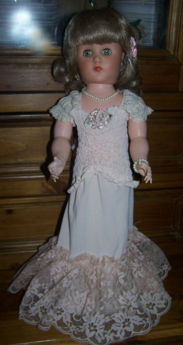 UNKNOWN DOLL WITH HARD PLASTIC WALKER BODY AND VINYL HEAD | #64177792