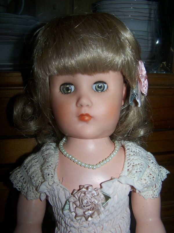 UNKNOWN DOLL WITH HARD PLASTIC WALKER BODY AND VINYL HEAD | #64177792